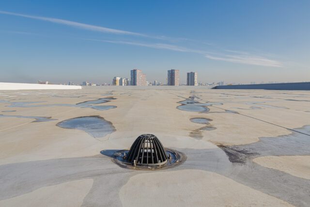 A Guide to Commercial Roof Drainage Systems | Heidler Roofing Blog